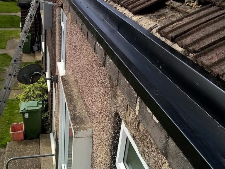 Liner for concrete gutter